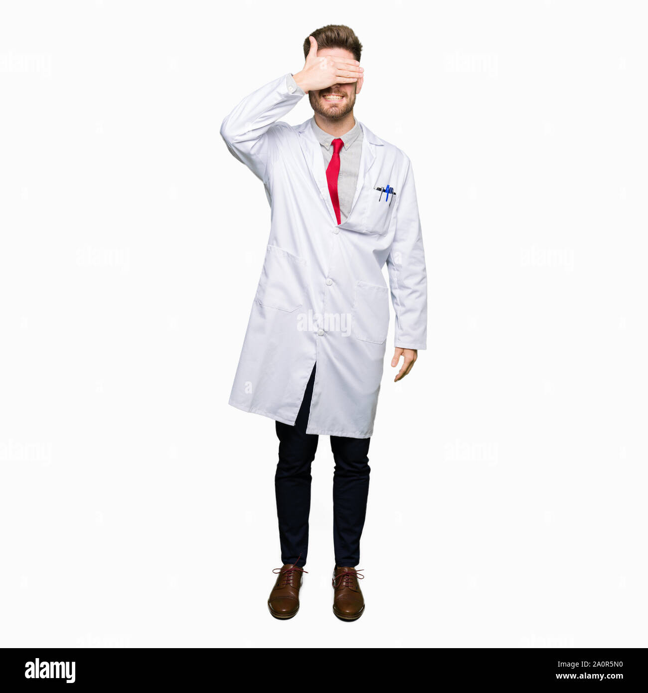 Young handsome scientist man wearing glasses smiling and laughing with ...