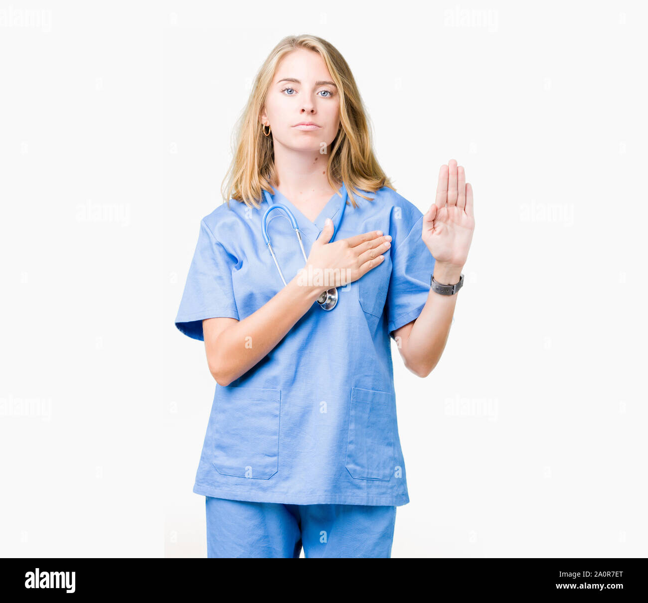 Beautiful young doctor woman wearing medical uniform over isolated ...