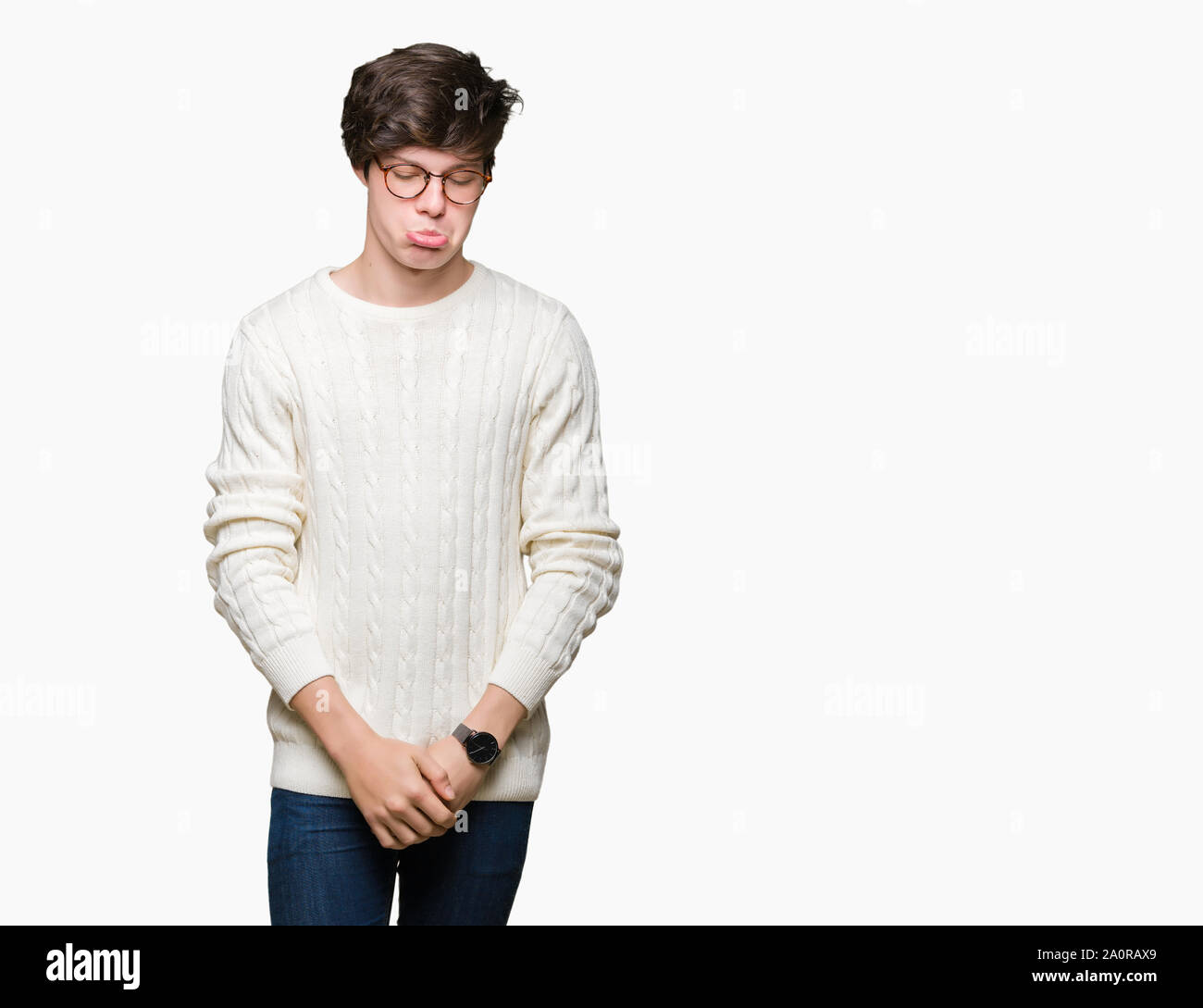 Young handsome man wearing glasses over isolated background depressed ...