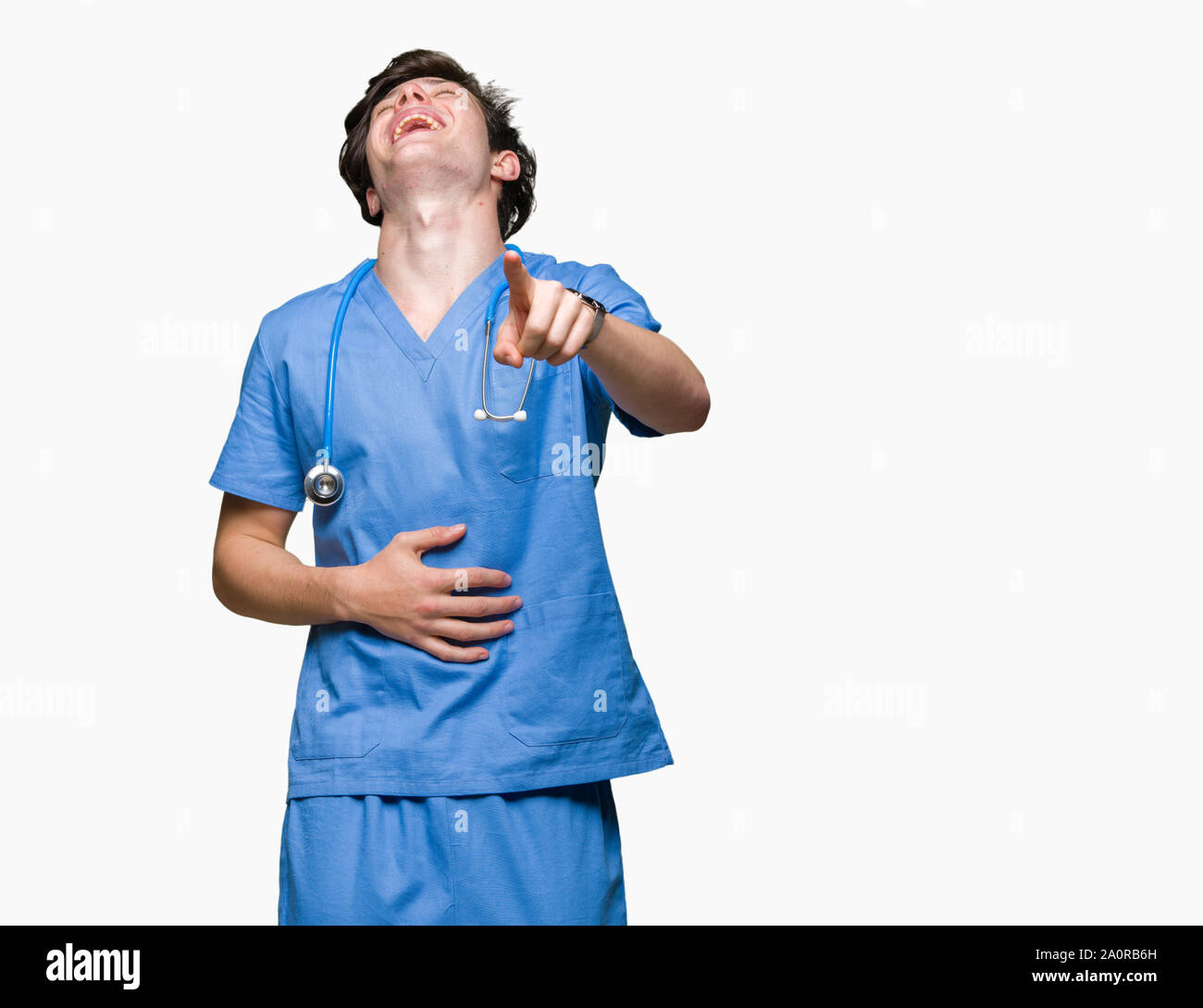 Young doctor wearing medical uniform over isolated background Laughing ...