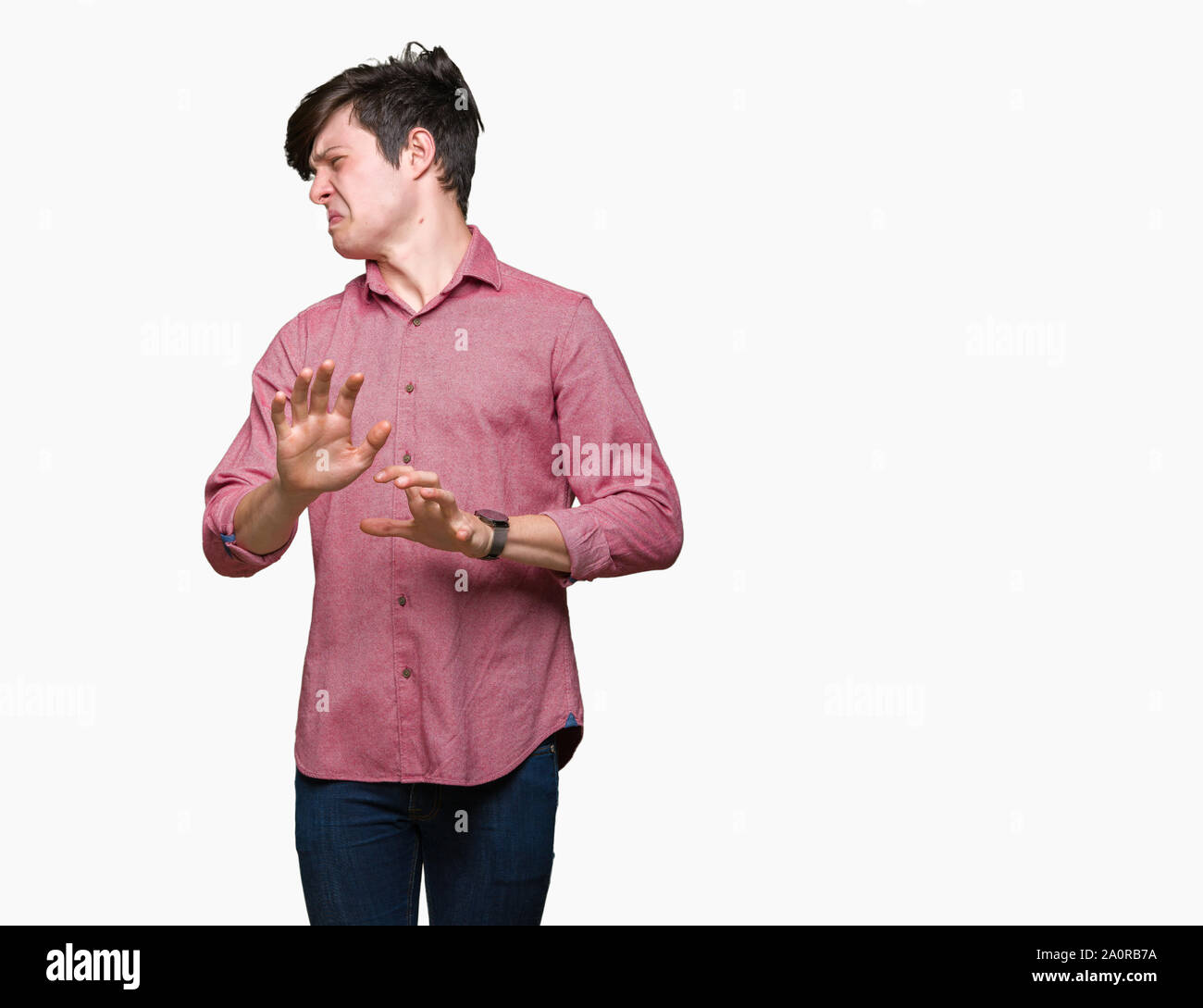 Young handsome business man over isolated background disgusted ...