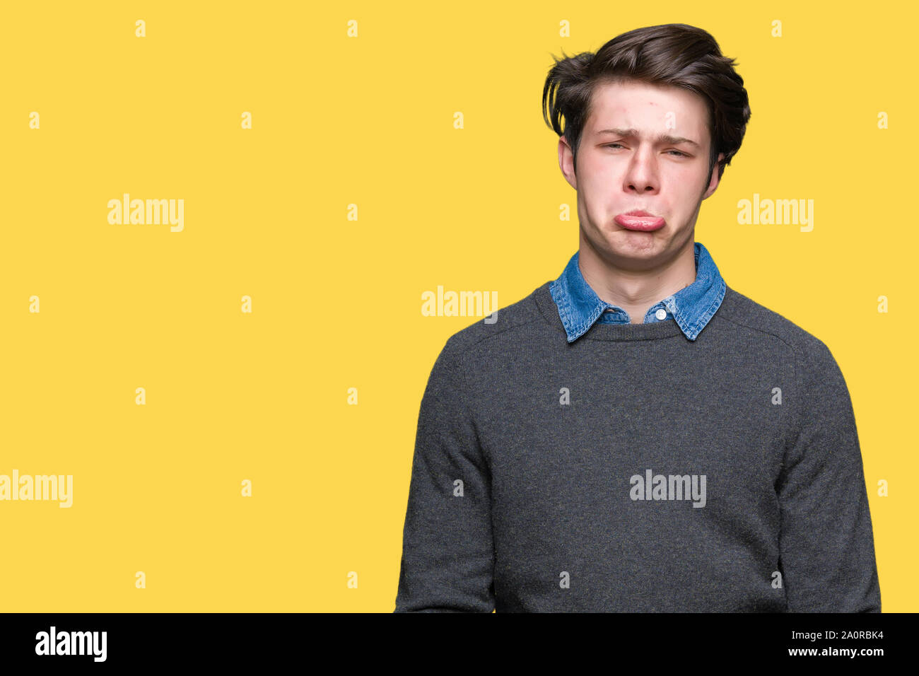 Young handsome elegant man over isolated background depressed and worry ...