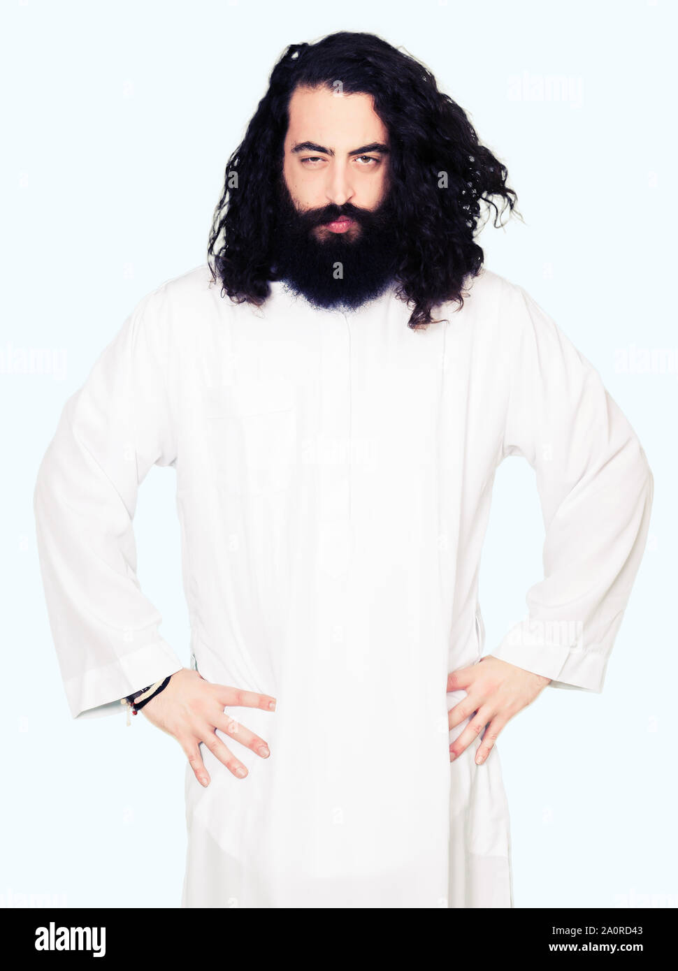 Man wearing Jesus Christ costume skeptic and nervous, frowning upset ...