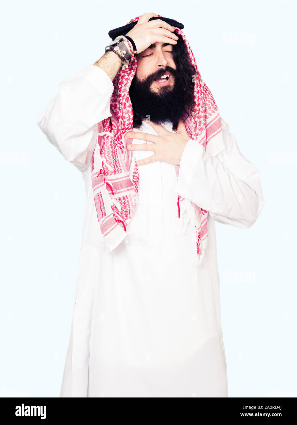 Arabian business man with long hair wearing traditional keffiyeh scarf ...