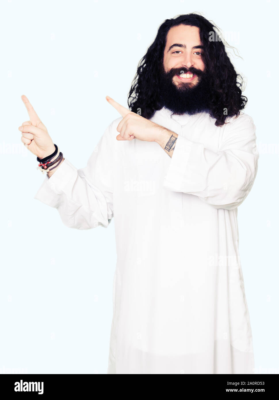 Man wearing Jesus Christ costume smiling and looking at the camera ...