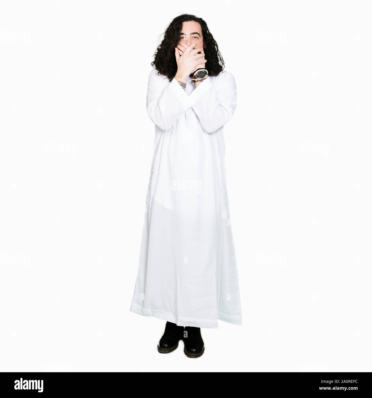 Man wearing Jesus Christ costume shocked covering mouth with hands for ...