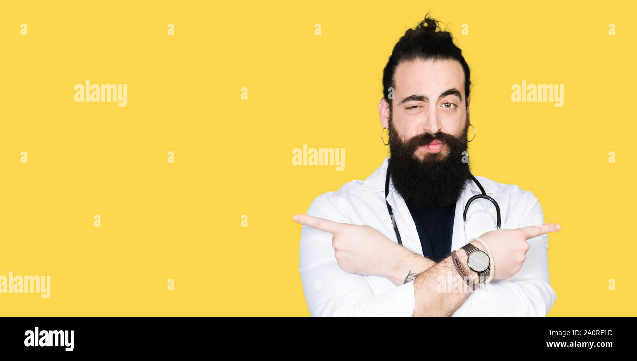 Doctor with long hair wearing medical coat and stethoscope Pointing to ...