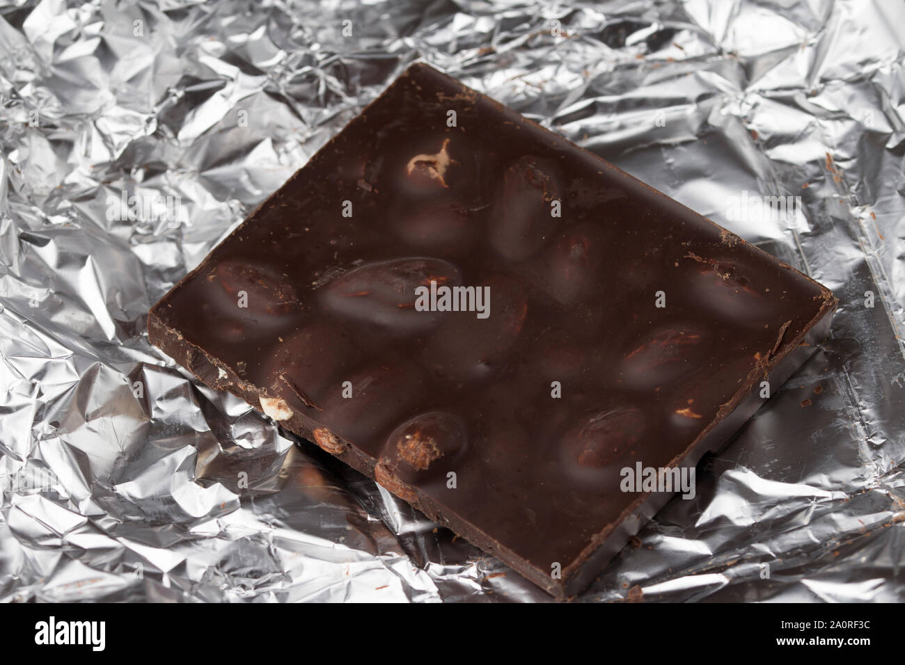 Bite chocolate in wrapper hi-res stock photography and images - Alamy