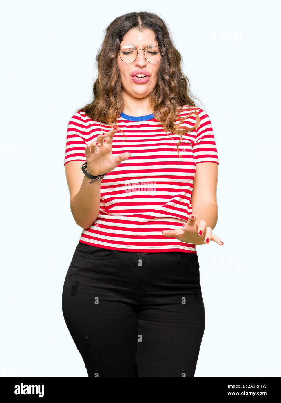 Young beautiful woman wearing glasses disgusted expression, displeased ...