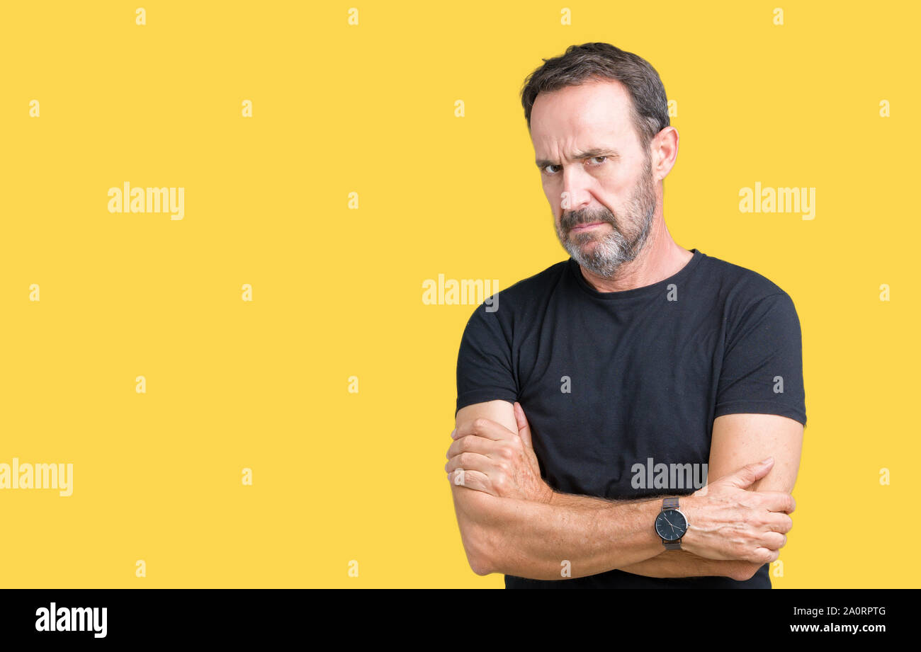 Handsome middle age hoary senior man over isolated background skeptic ...