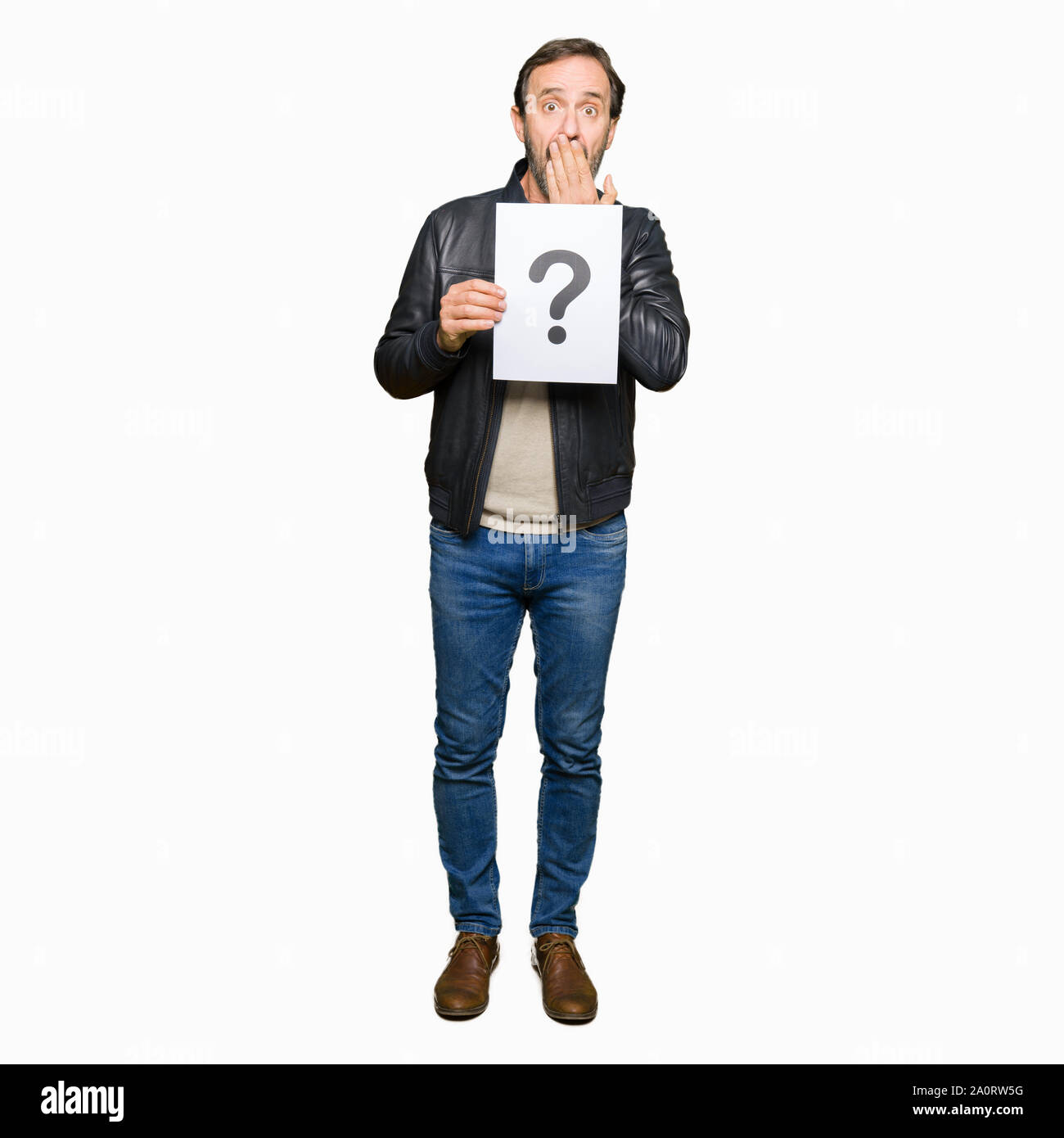 Handsome middle age man holding paper with question mark cover mouth ...
