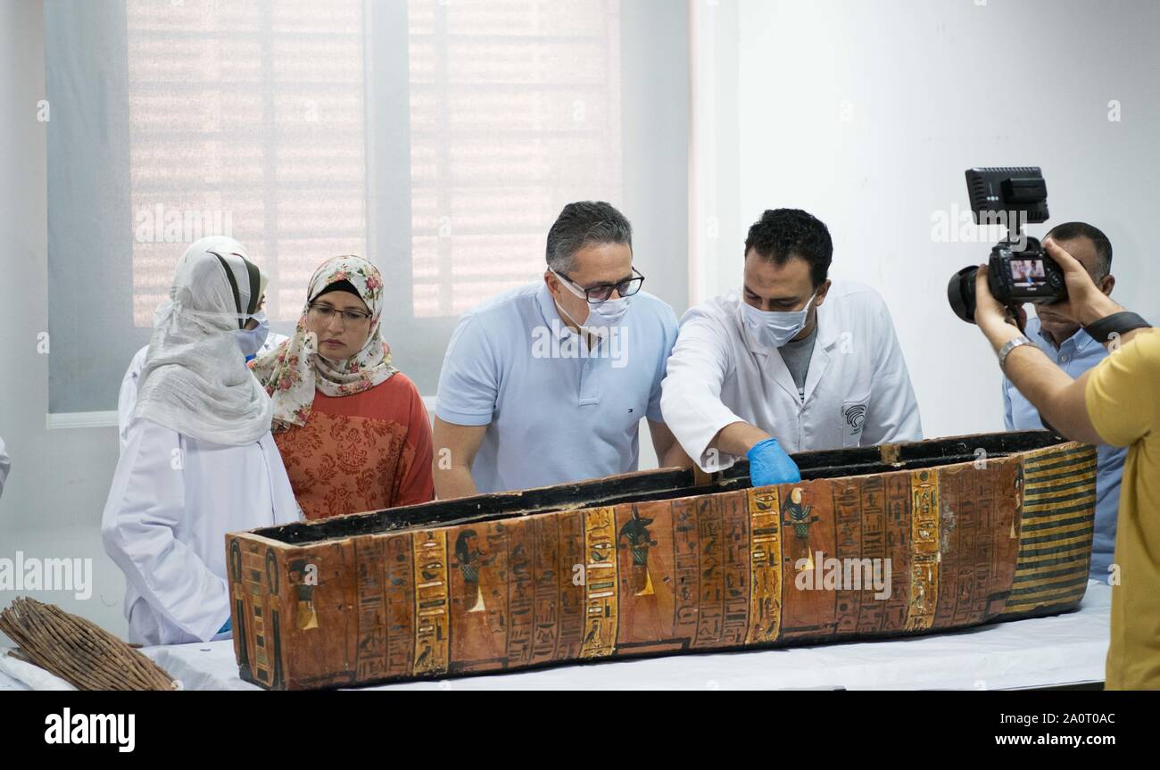 Cairo, Egypt. 21st Sep, 2019. Egyptian Minister of Antiquities Khaled al-Anany (3rd L) looks at ...