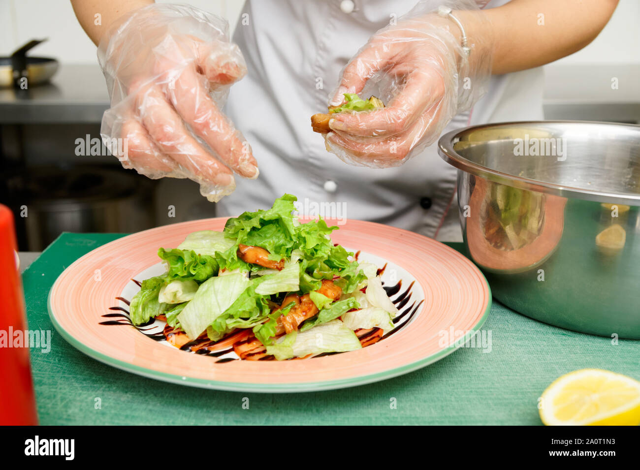 Chef is cooking appetizer at commercial kitchen Stock Photo - Alamy