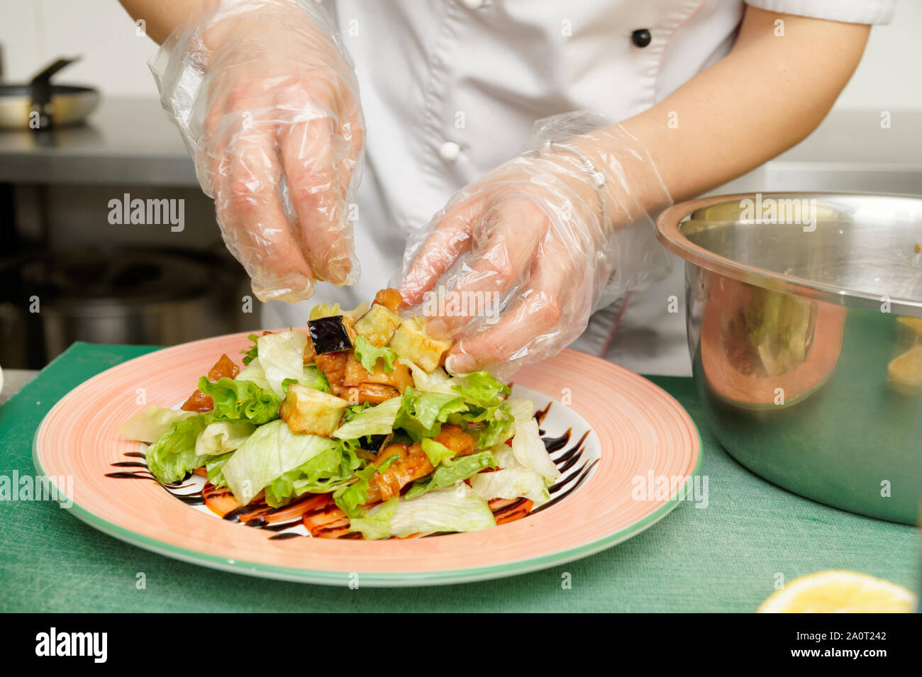 Chef is cooking appetizer at commercial kitchen Stock Photo - Alamy
