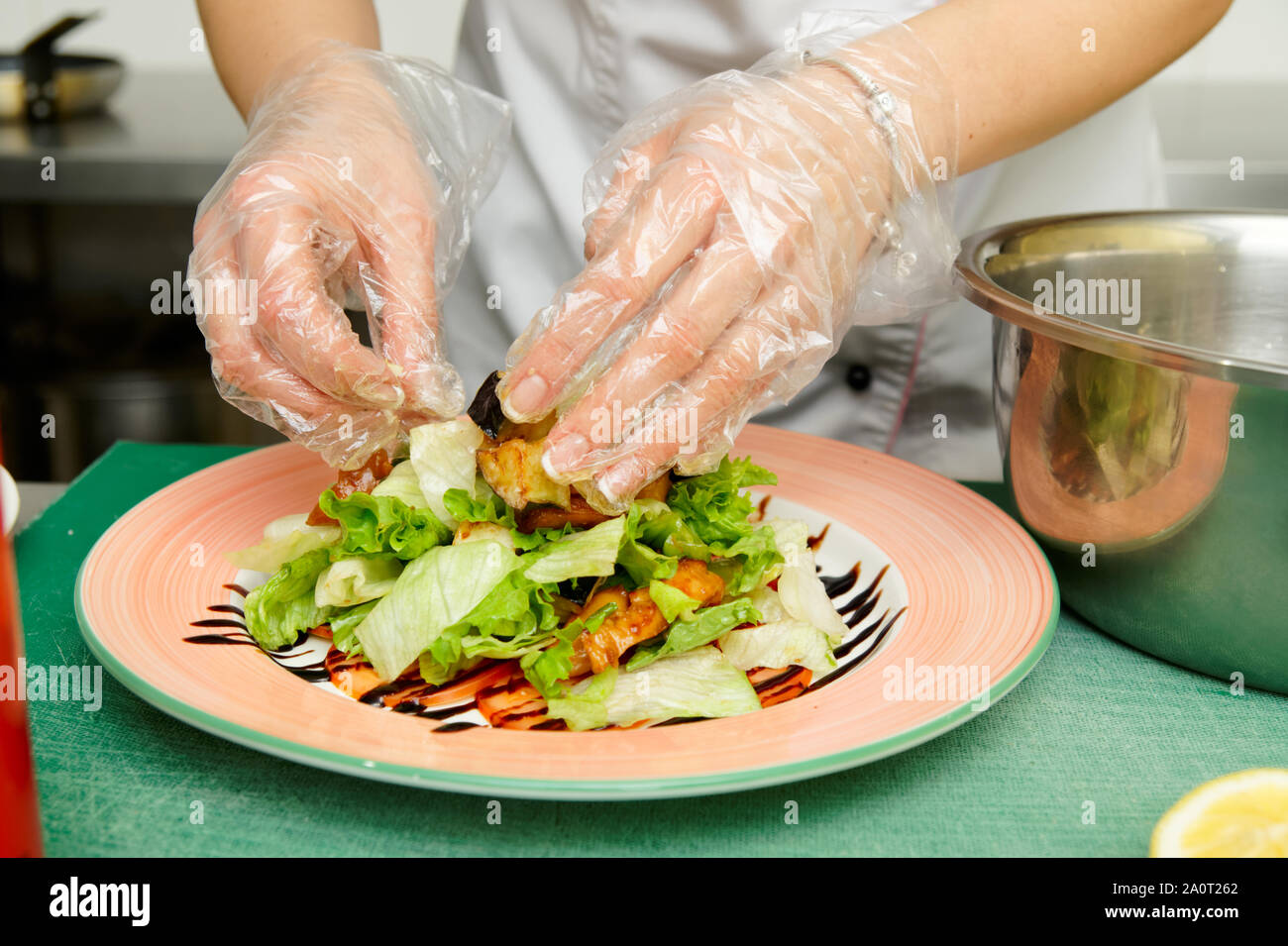 Chef is cooking appetizer at commercial kitchen Stock Photo - Alamy