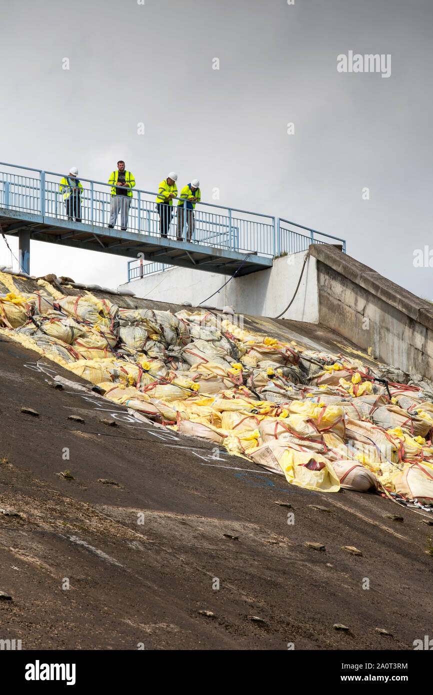 Pumping out water from Toddbrook Reservoir above Whaley Bridge in ...