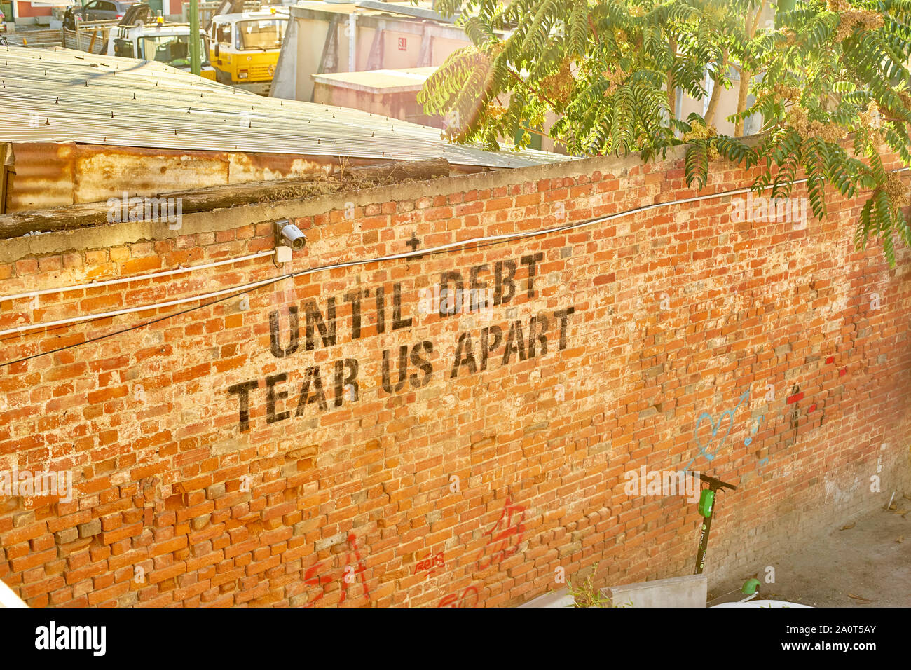 Lisbon, Portugal - August 28, 2019: "Until debt tear us apart " street ...