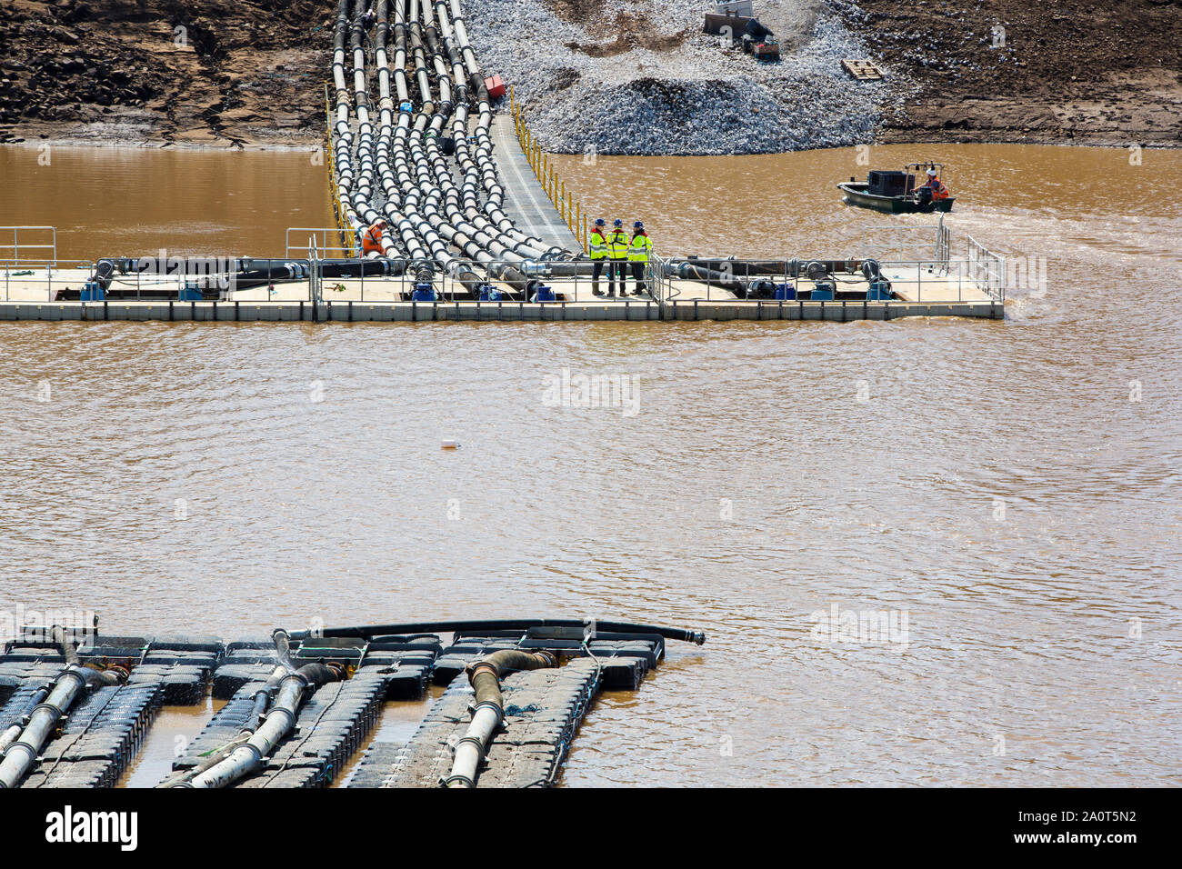 Pumping out water from Toddbrook Reservoir above Whaley Bridge in ...