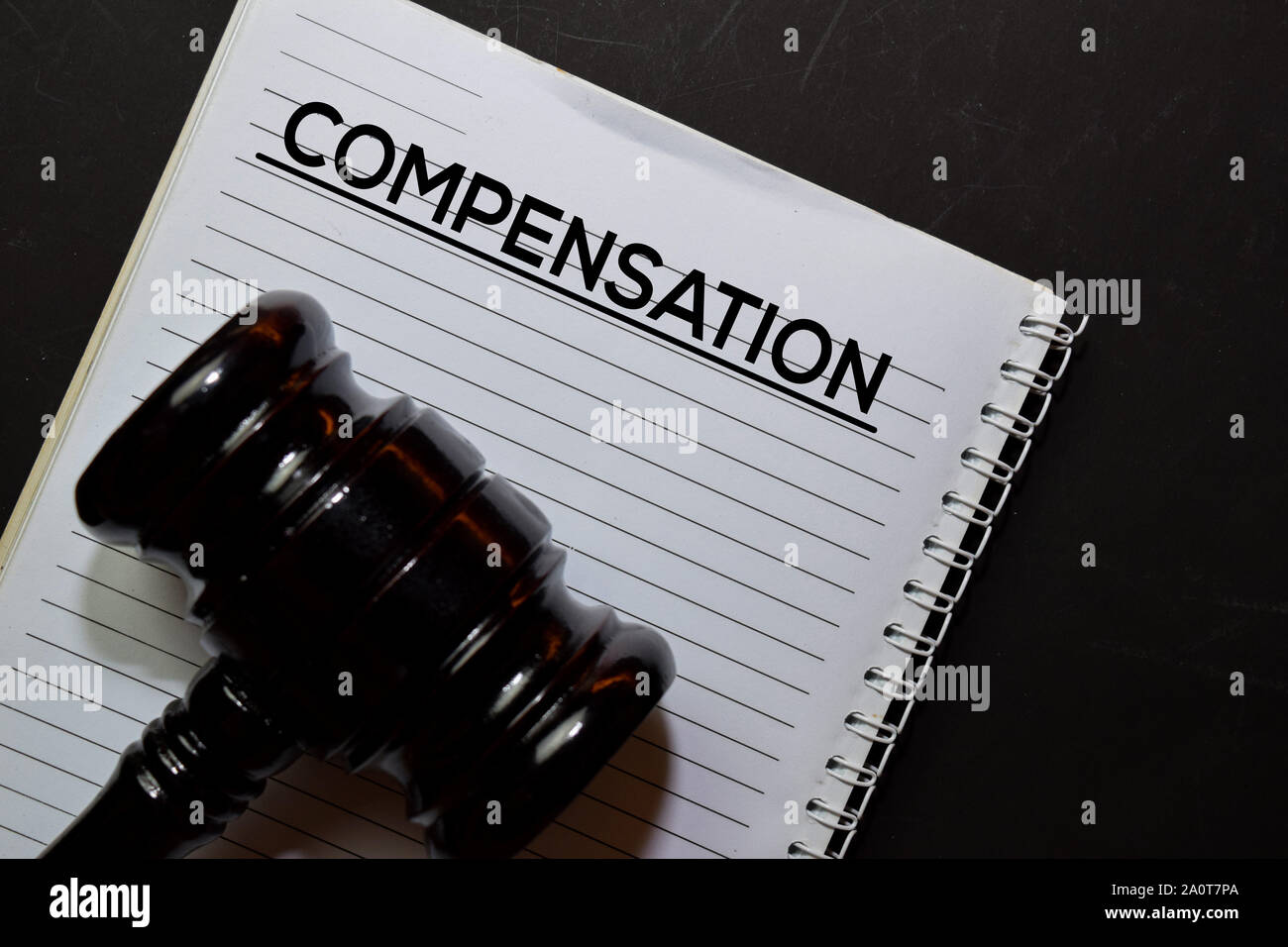 Compensation text on Document and gavel isolated on office desk. Law ...