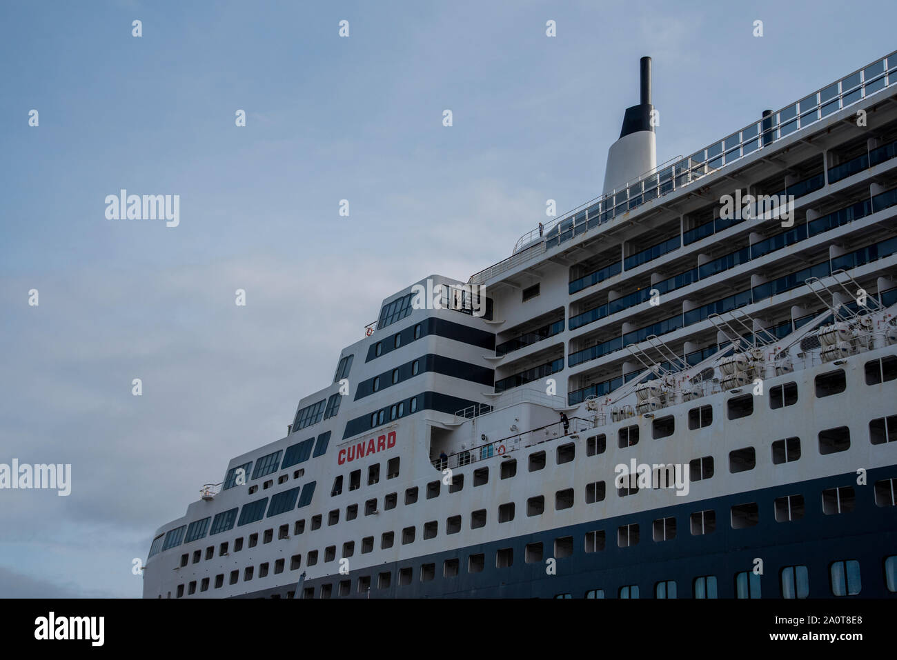 Queen Mary 2, Cunard ocean liner in port in Alesund, Norway Stock Photo ...