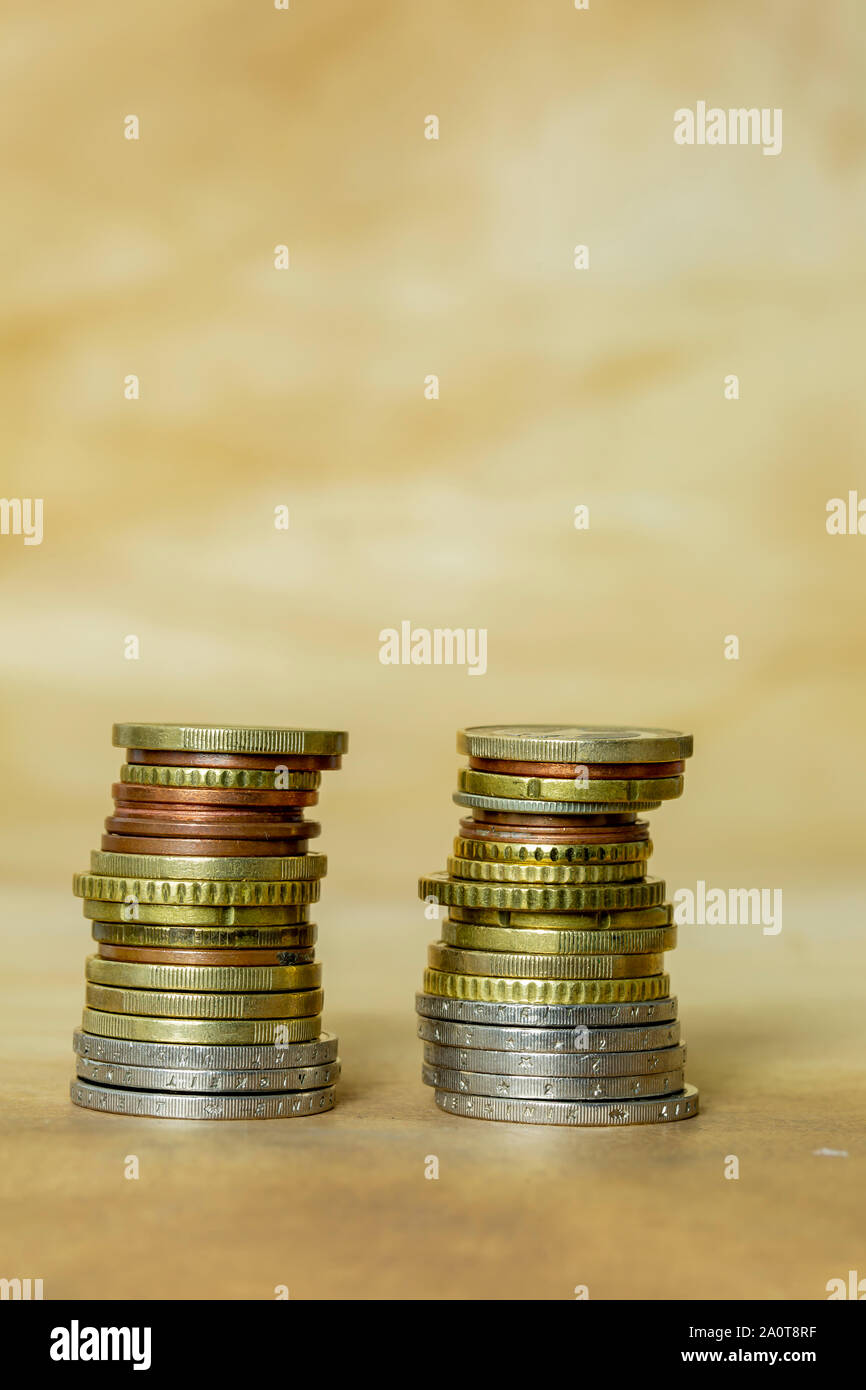 Coin Stacks in a Row Stock Photo - Alamy