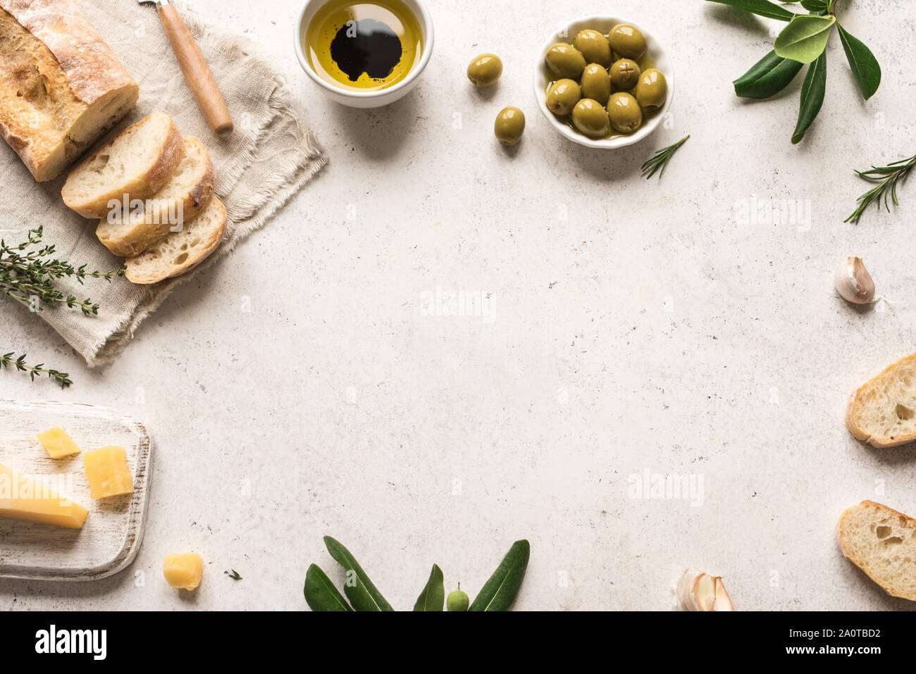 Italian food background. Fresh italian ciabatta bread with herbs, olive ...