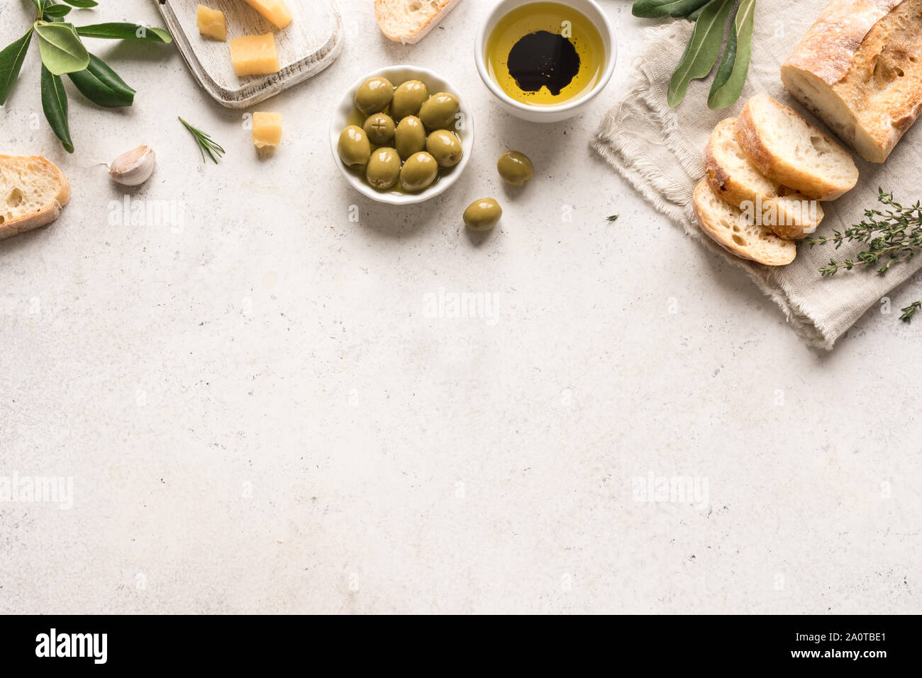 Italian food background. Fresh italian ciabatta bread with herbs, olive ...