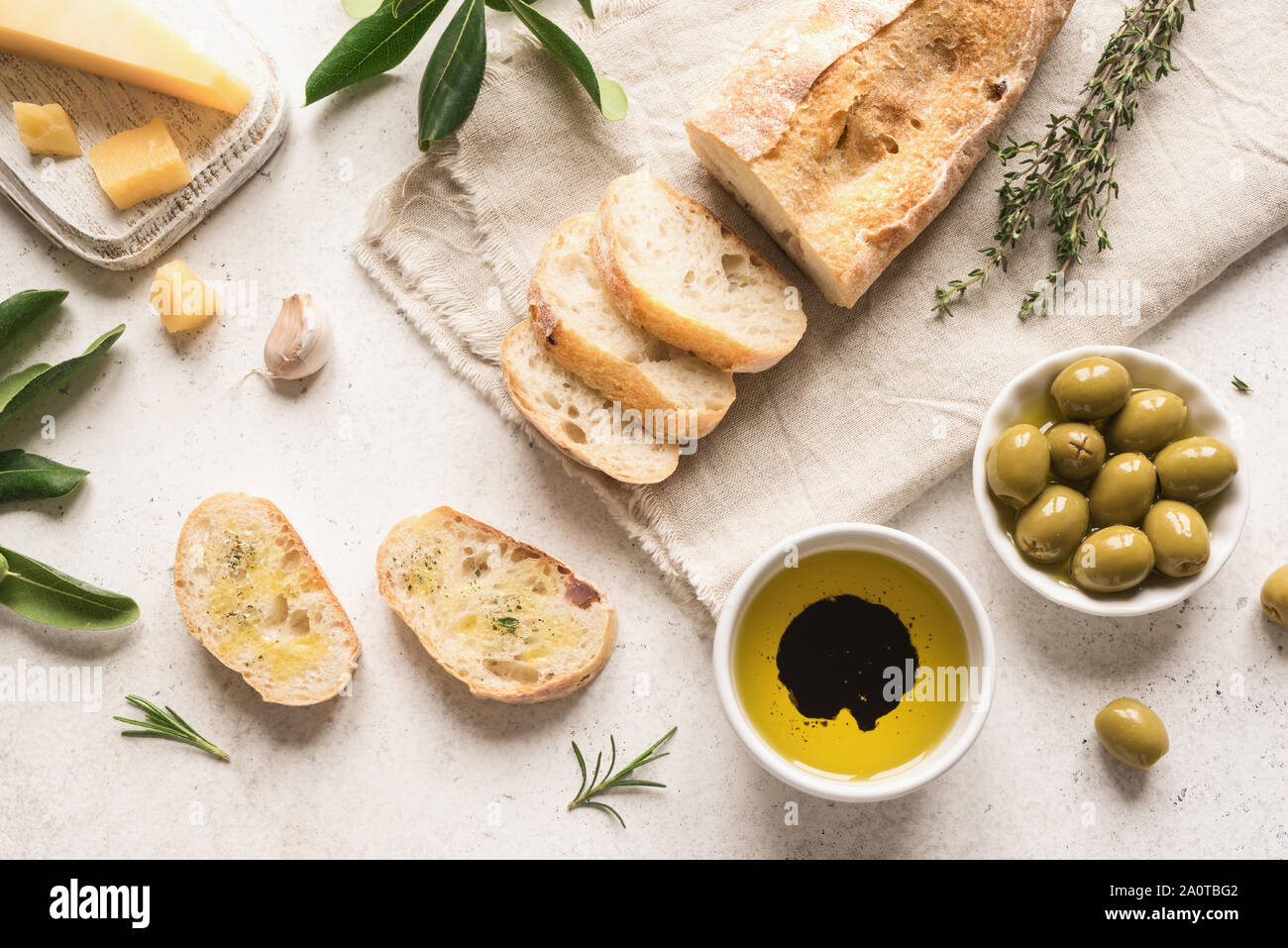 Italian food background. Fresh italian ciabatta bread with herbs, olive ...