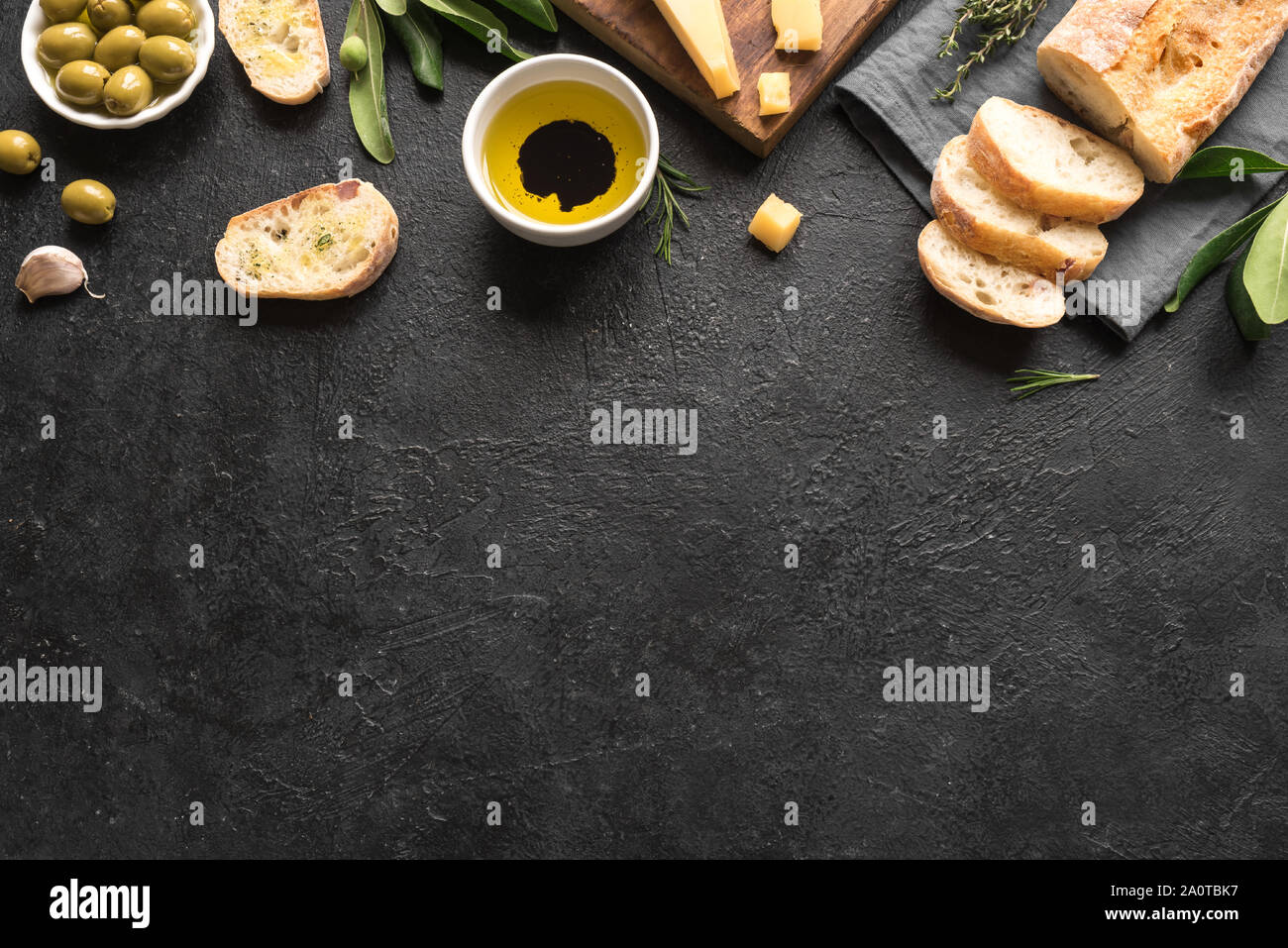 Italian food background. Fresh italian ciabatta bread with herbs, olive ...