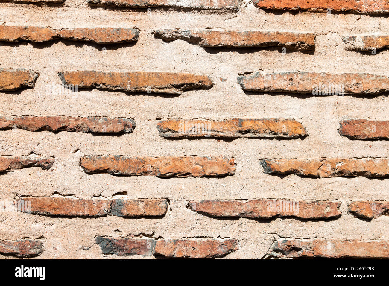 Macro shot of stone and brick wall, background Stock Photo - Alamy