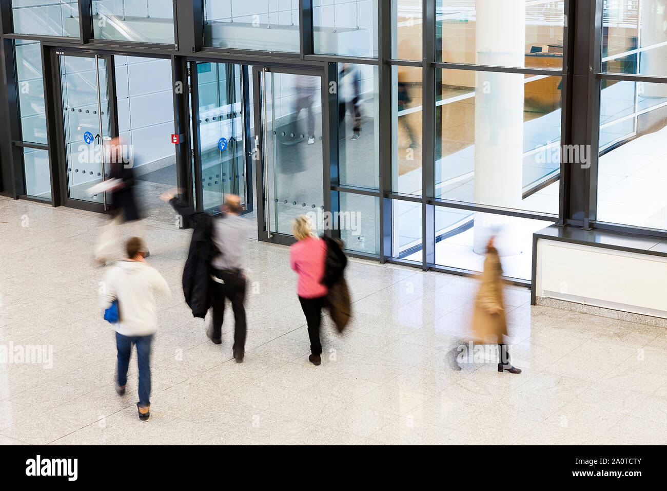 Group of business people walking, real people Stock Photo - Alamy