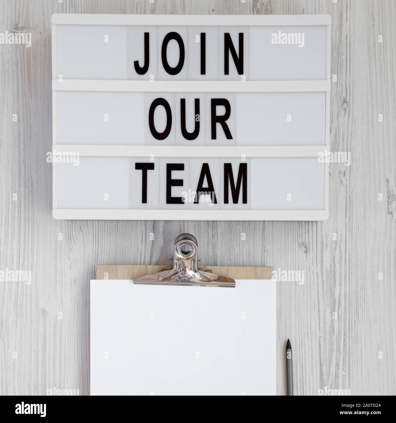 'Join our team' words on a modern board, clipboard with blank sheet of ...