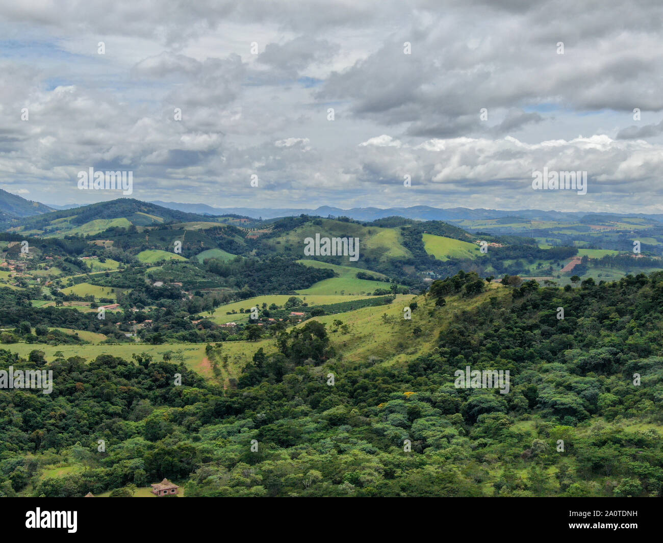 Aerial view of green tropical mountain and small valley in Monte Alegre ...