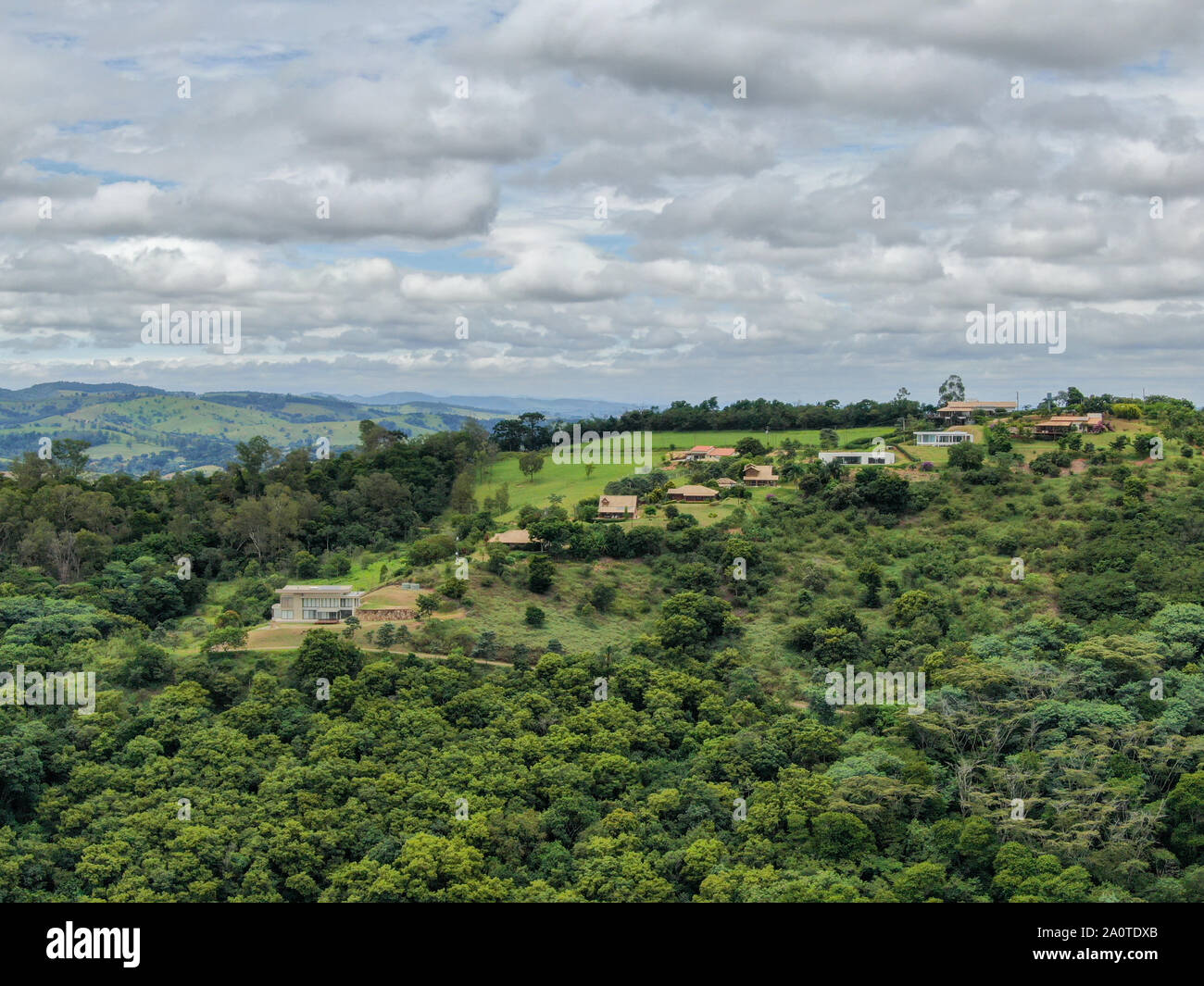 Aerial view of green tropical mountain and small valley in Monte Alegre ...