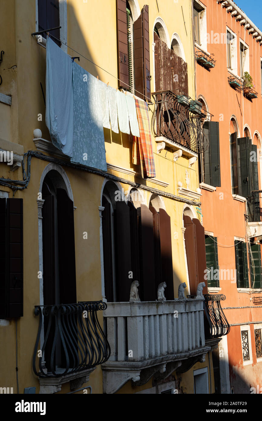 Washing hanging on a washing line from an upstairs window, Venice ...