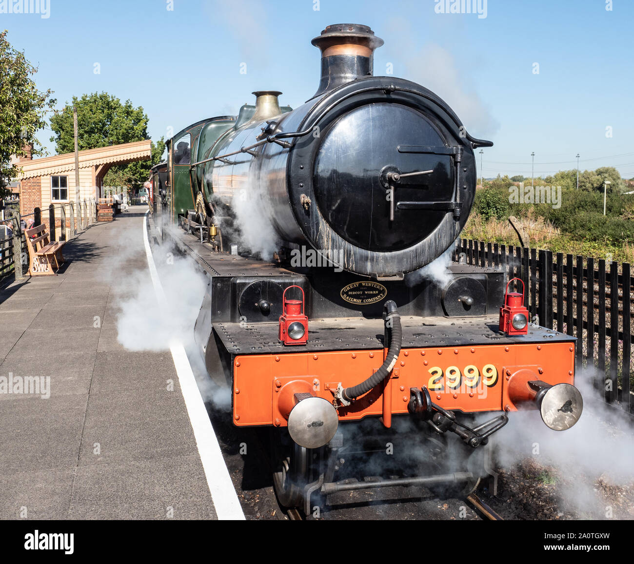 Steam train arrives in station Stock Photo - Alamy