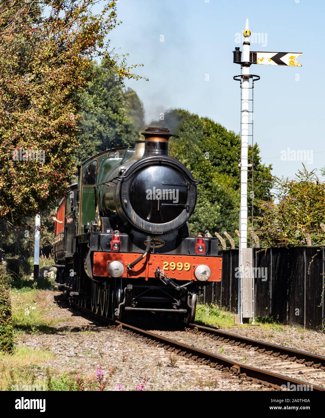 Steam train passes a signal Stock Photo - Alamy