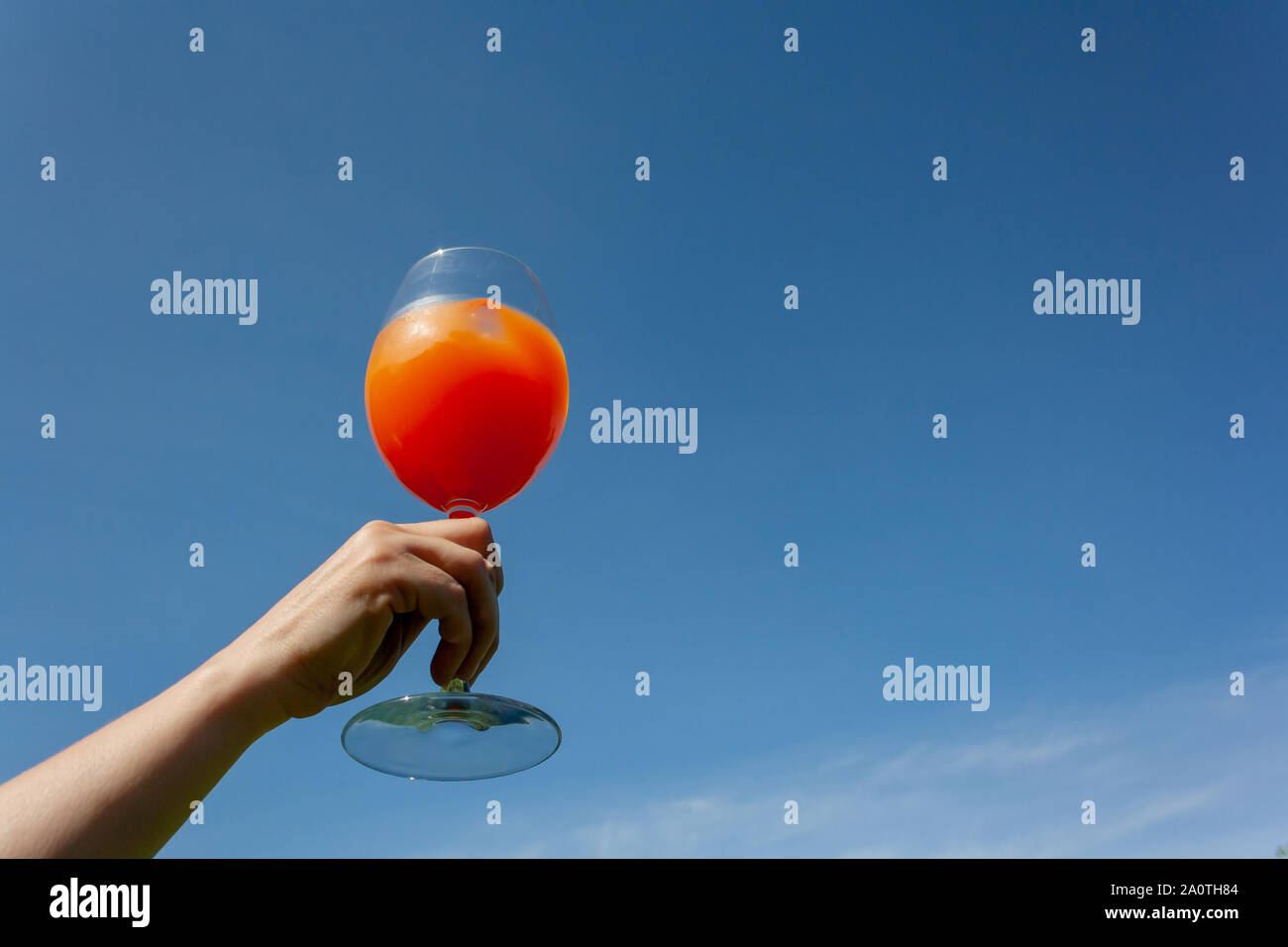 Veneziano an Italian wine-based cocktail on a blue sky background Stock ...