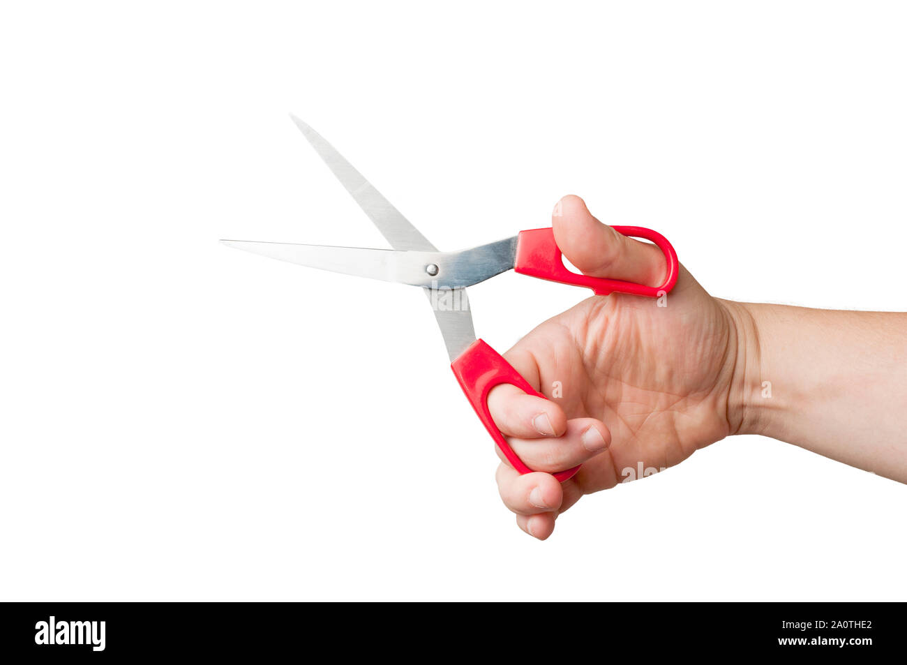 Man hold a red pair of scissors on white background Stock Photo - Alamy
