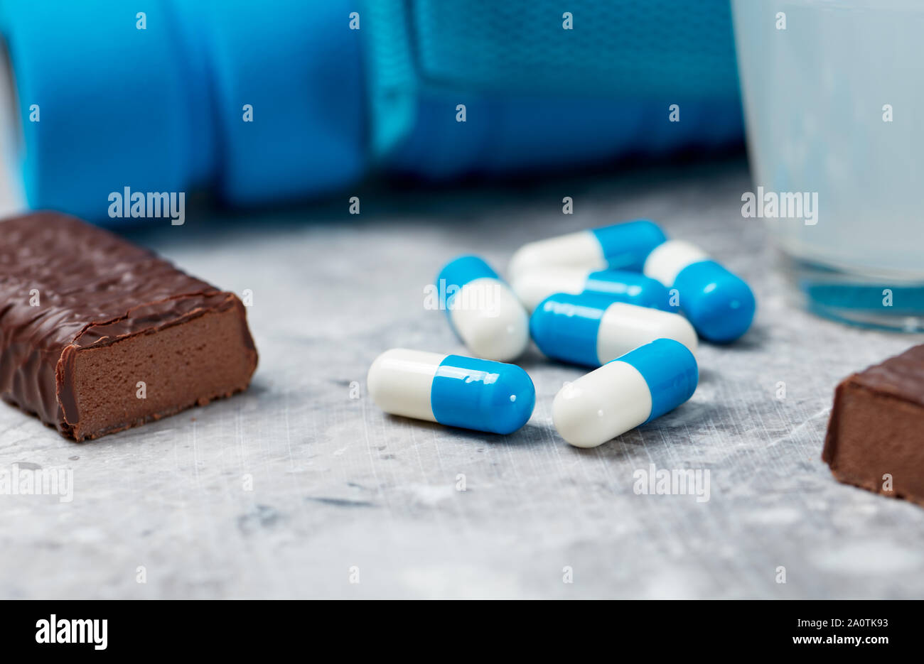 High Protein Bar, BCAA (amino acids) Drink, Creatine capsules and blue ...