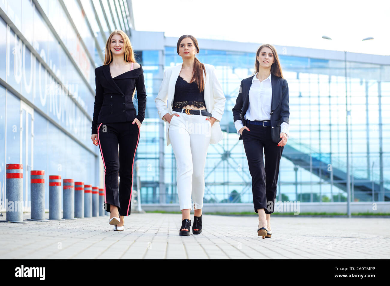 Three successful women left the office. Concept for business, boss ...