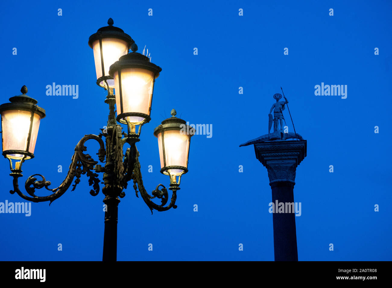 Lamp post and St Theodore statue on column, Piazzetta, St Mark's Square ...
