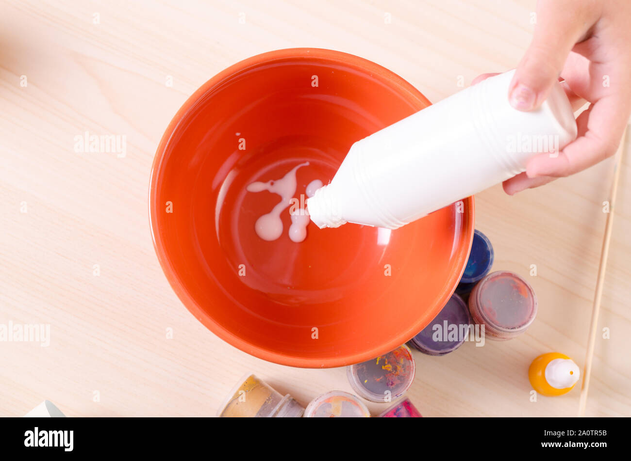 Slime making process. Girl making slime, worldwide popular self made ...