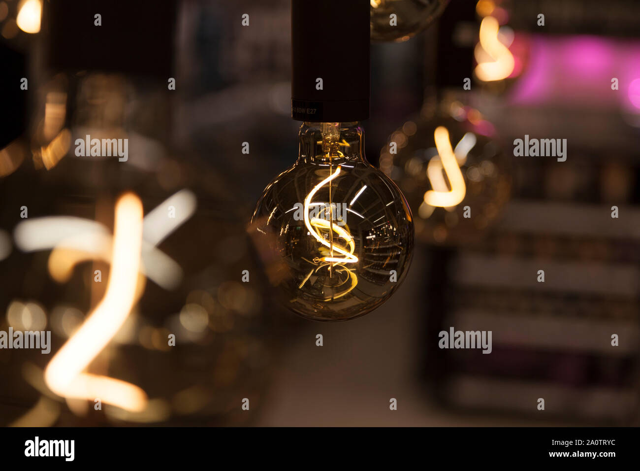 light bulbs hanging from ceiling, abstract image with bokeh background ...