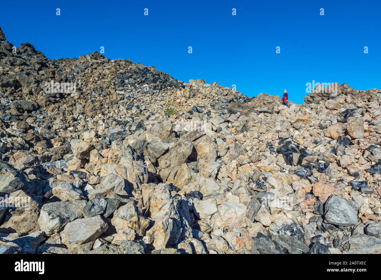 Oregon, Newberry National Volcanic Monument, Big Obsidian Flow Trail, female hiker Stock Photo ...