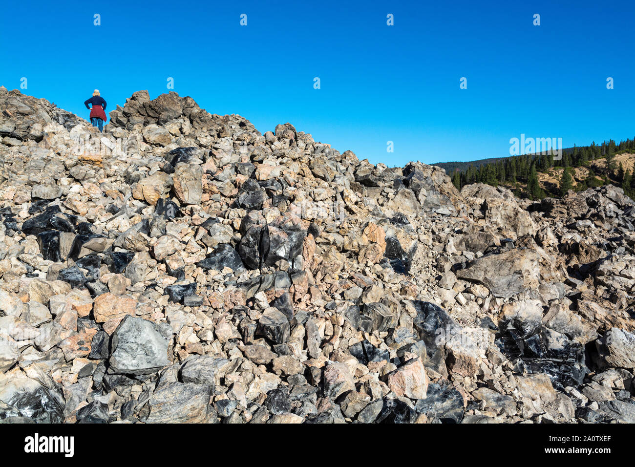 Oregon, Newberry National Volcanic Monument, Big Obsidian Flow Trail, female hiker Stock Photo ...