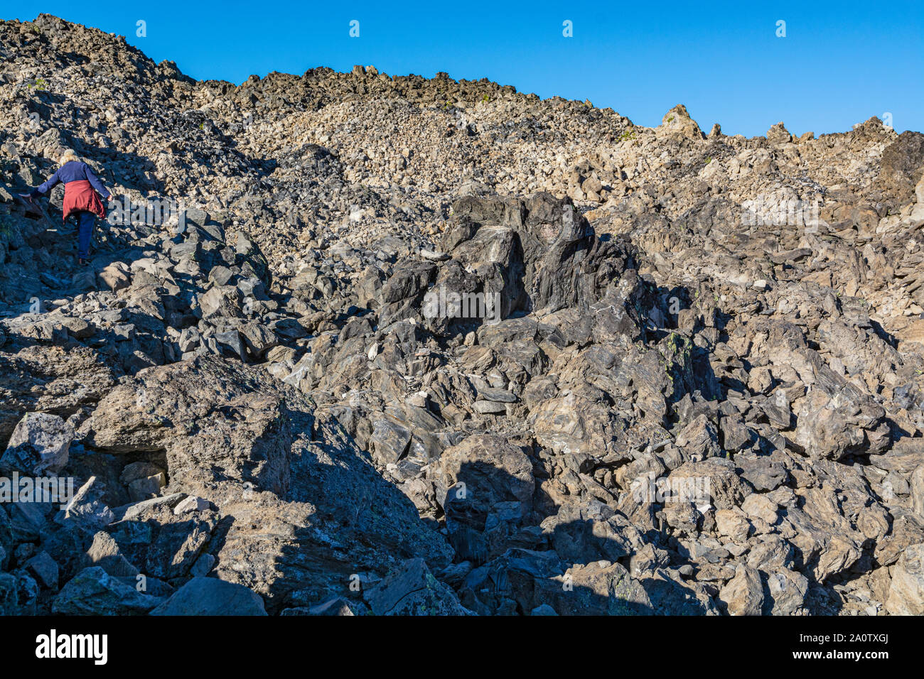 Oregon, Newberry National Volcanic Monument, Big Obsidian Flow Trail, female hiker Stock Photo ...