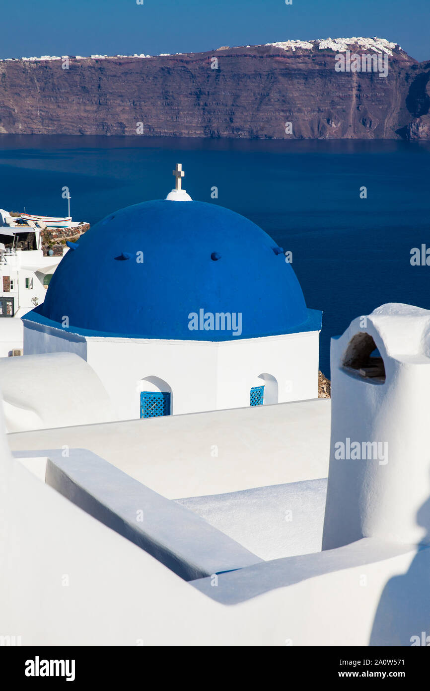 Traditional architecture of the churches of the Oia City in Santorini ...