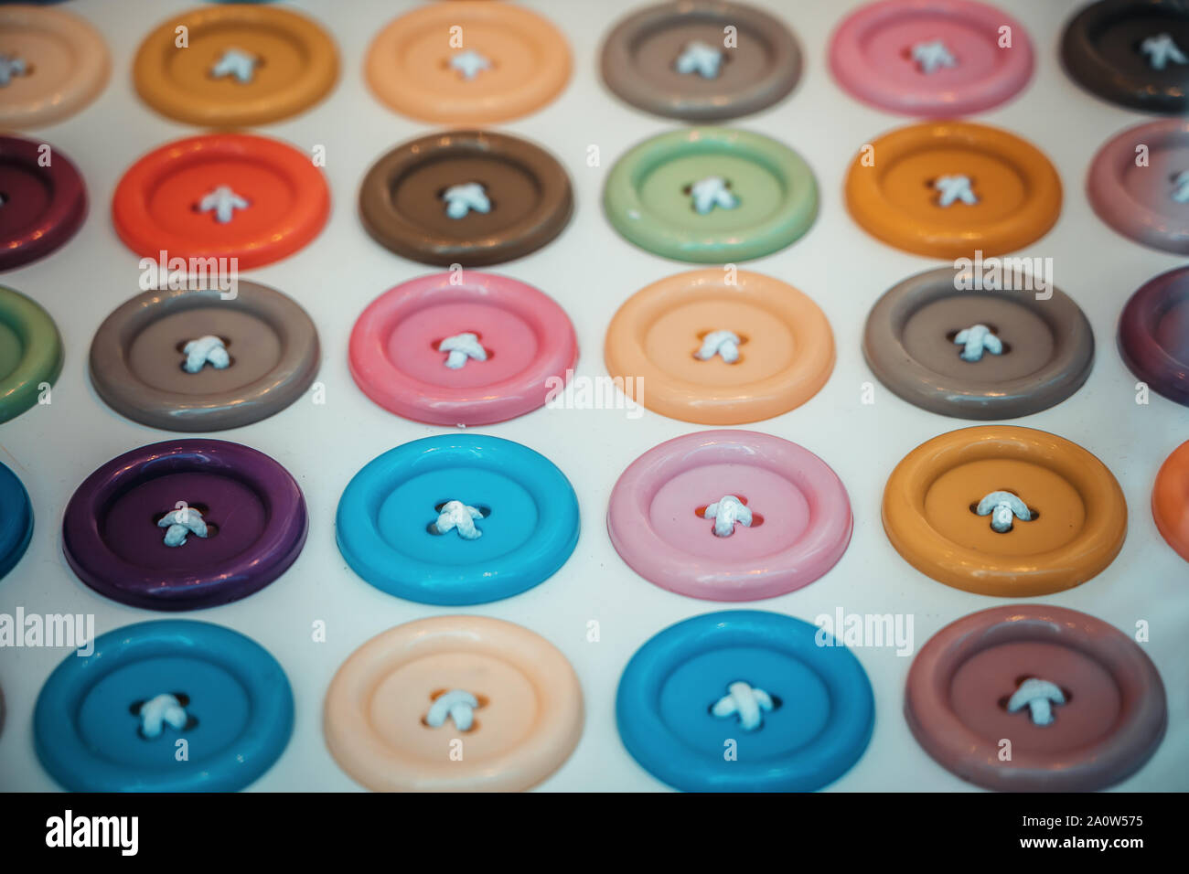 Colorful button in vintage style; button background Stock Photo - Alamy