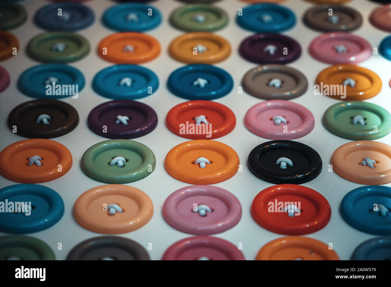 Colorful button in vintage style; button background Stock Photo - Alamy